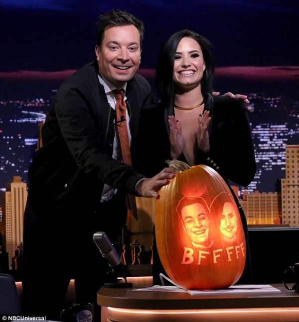 Demi Lovato Almost Pops Out of Her Tuxedo Dress While on “Jimmy Fallon ...