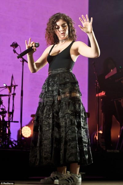 Lorde performing on the stage with her Signature Dance Moves at ...