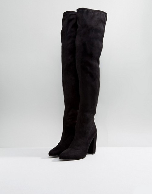 Leggy Joan Smalls shows off her supermodel figure in thigh high boots ...